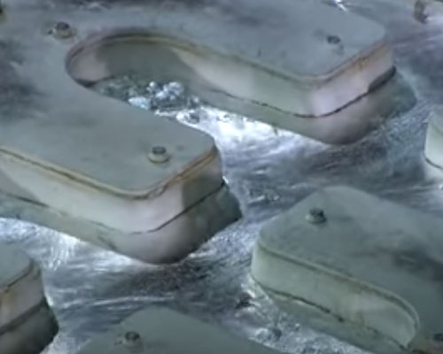 Trough-Type Distributor for Hot Top Casting System